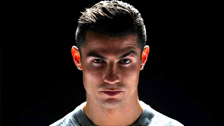 Cristiano Ronaldo Staring Intense Portrait Dark Desktop Wallpaper